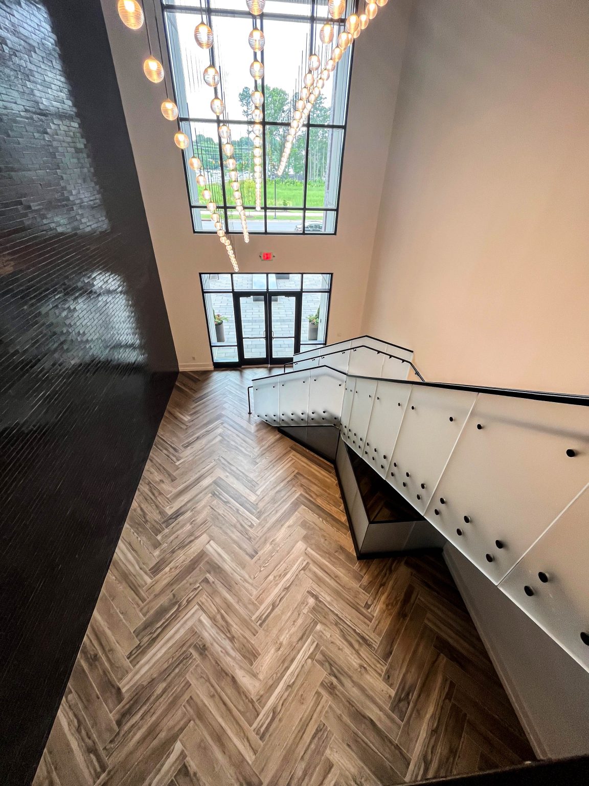 Optik™ Boss Railing Transforms The Hartley Lobby | HDI Railing Systems